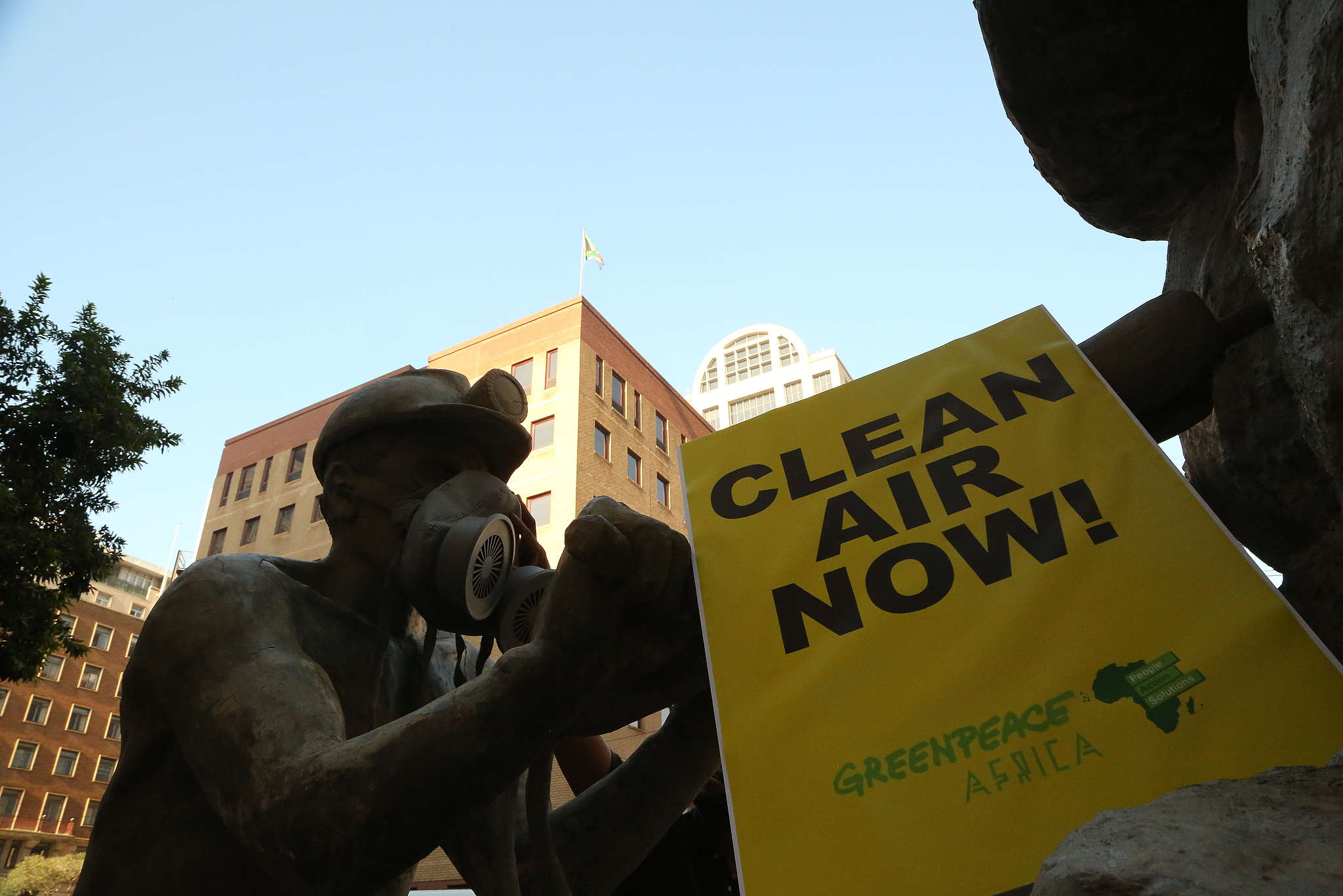 Activists scale statues to draw attention to deaths caused by Eskom’s ...