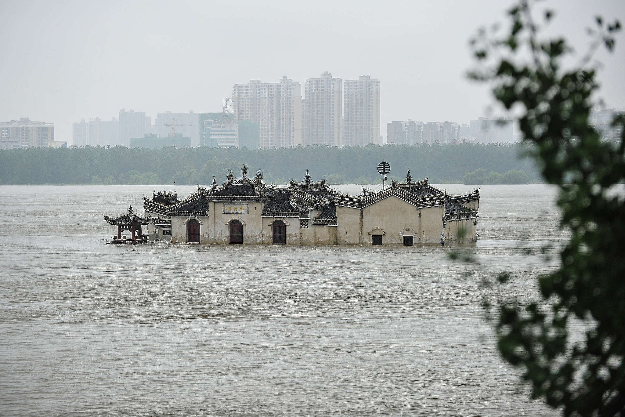 Flooded cities and millions displaced in pictures - Greenpeace ...