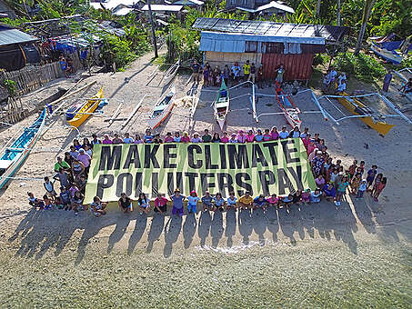 MAKE POLLUTERS PAY - Greenpeace Philippines